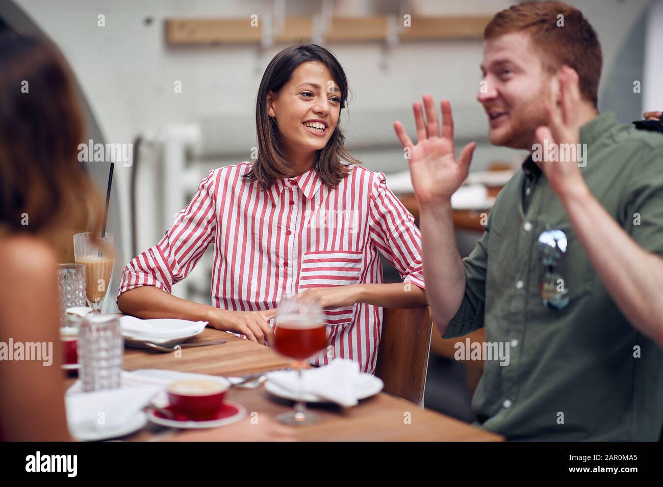 Group friend communicating hi-res stock photography and images - Alamy