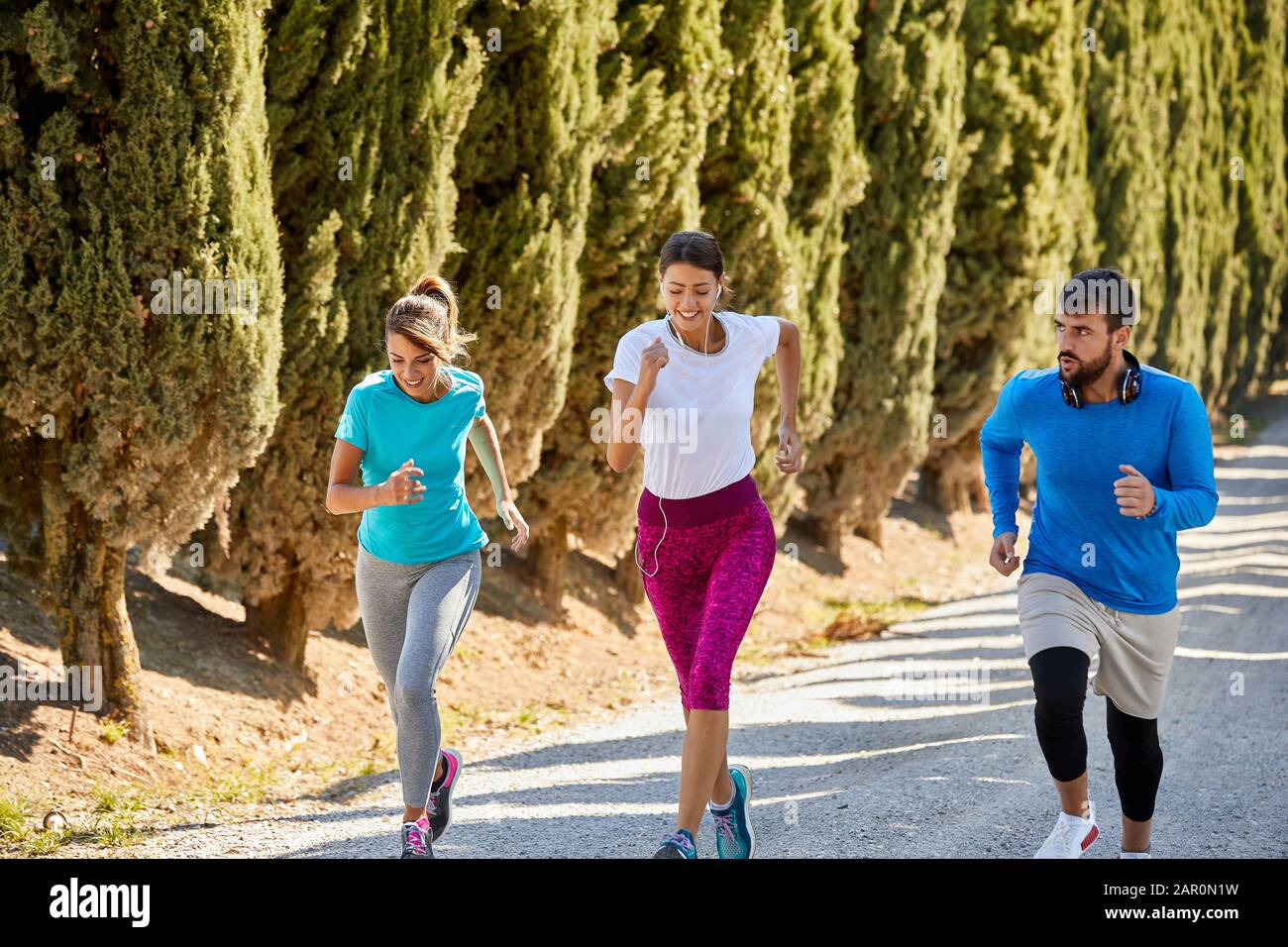 Male female runners together hi-res stock photography and images - Alamy