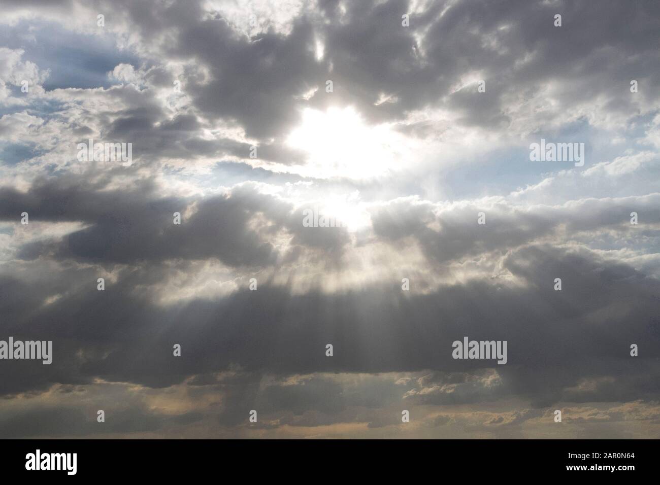 Sun rays shining through clouds in the sky, Mozambique-South Africa ...
