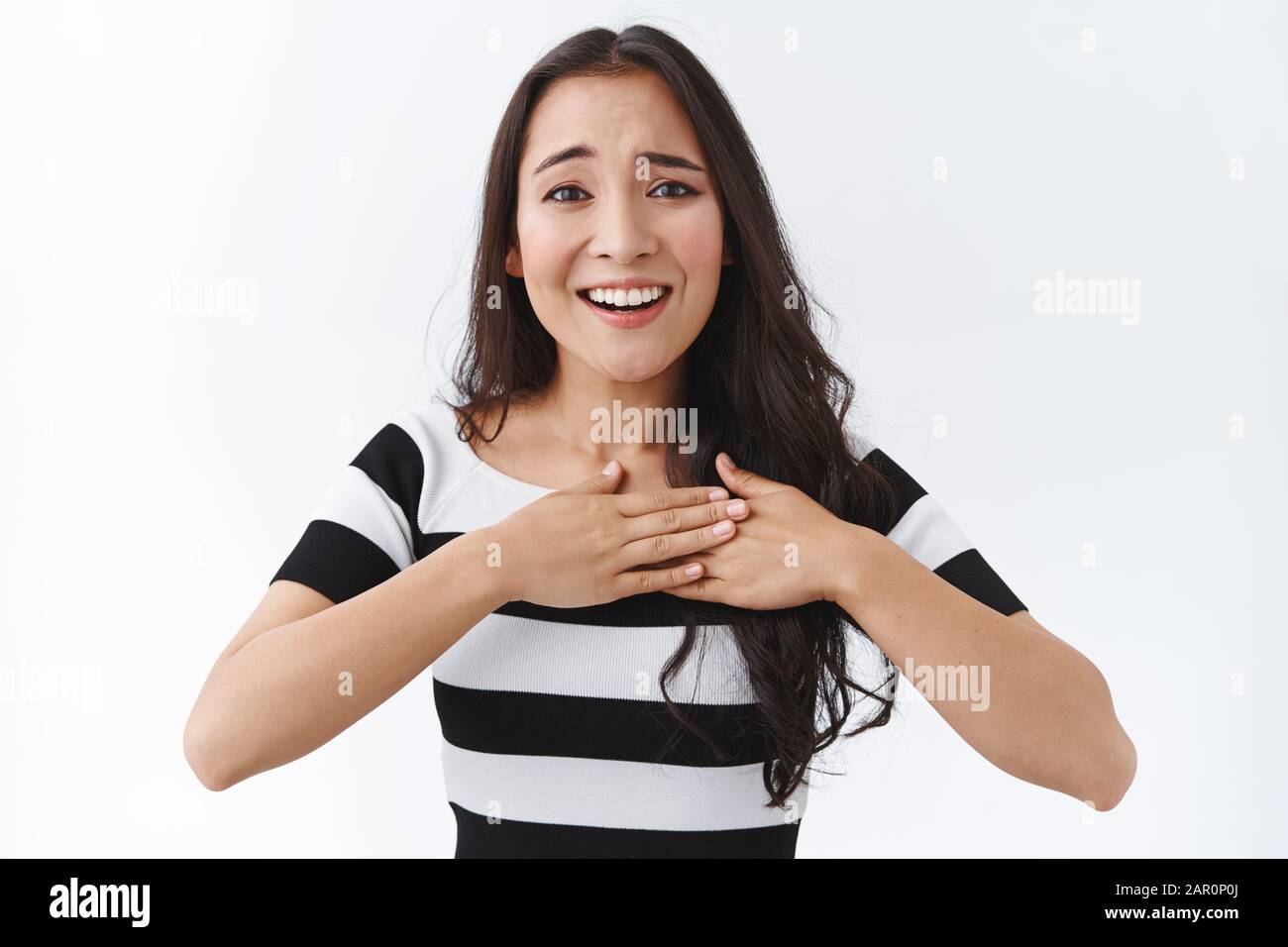 Touched And Flattered Silly Cute Asian Girl Press Hands To Heart And Smiling Sighing Grateful