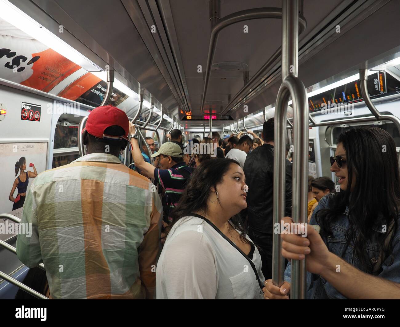 New York, USA - June 2, 2019: The interior of a crowded New York metro ...