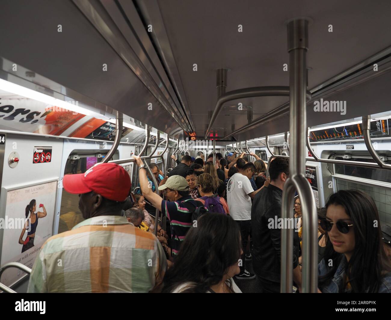 Standing holding crowd authority transportation hi-res stock ...