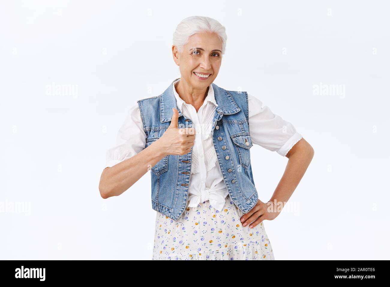 Happy, satisfied charming granny with pleased expression, smiling ...