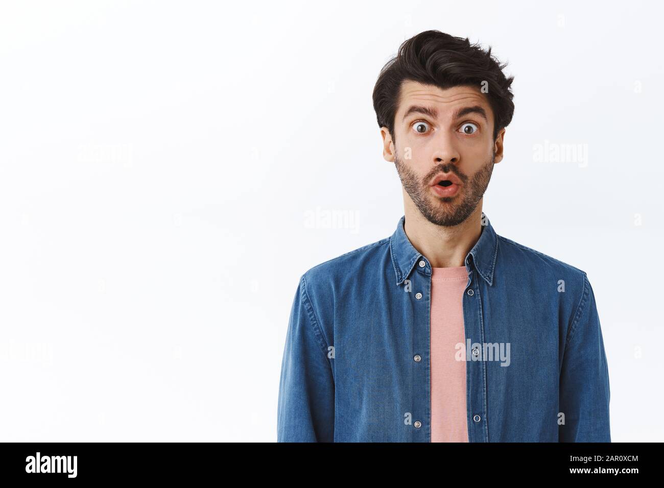 Surprised Shocked Handsome Bearded Man With Stylish Haircut Looking