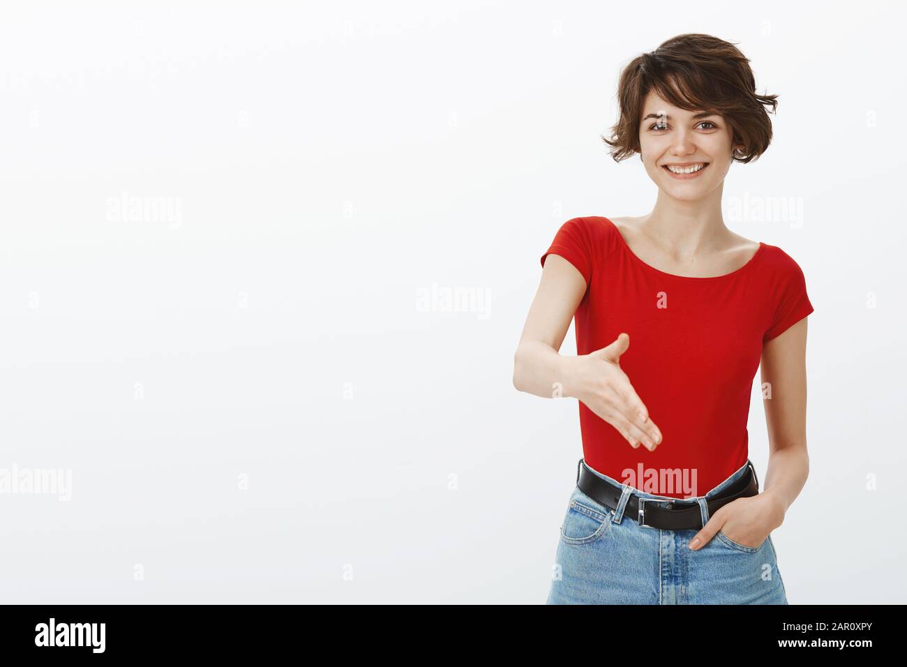 Nice to meet you. Cheerful temting lovely young girl short pixie ...