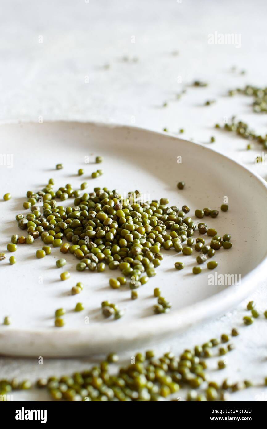 Dried mung beans on a ceramic plate close up Stock Photo - Alamy