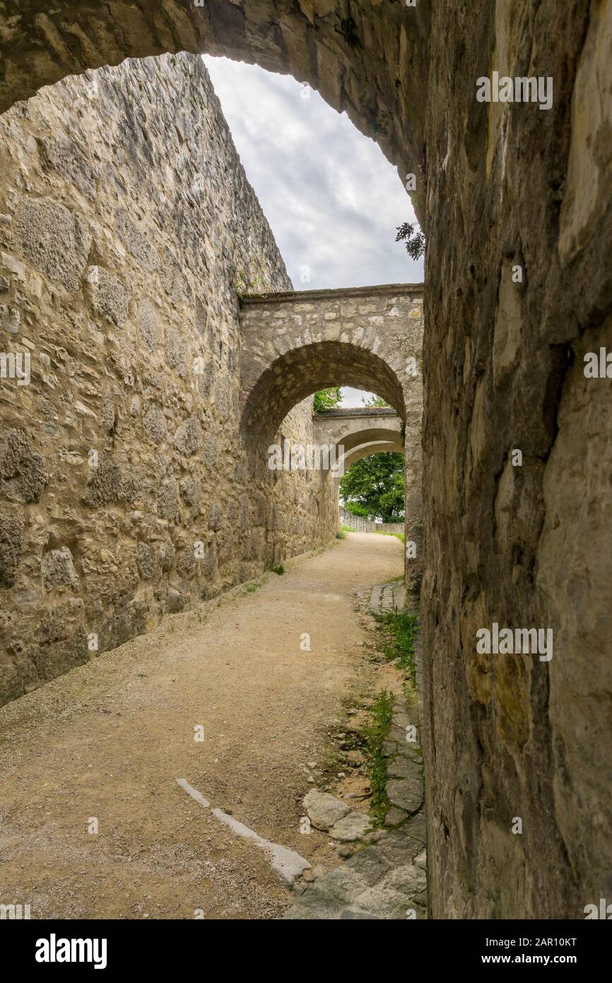 castle ruins and and bux trees in a medieval garden Stock Photo - Alamy