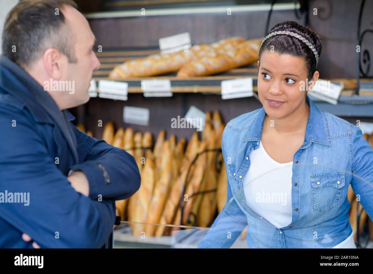 Bakery shop salesperson hi-res stock photography and images - Alamy