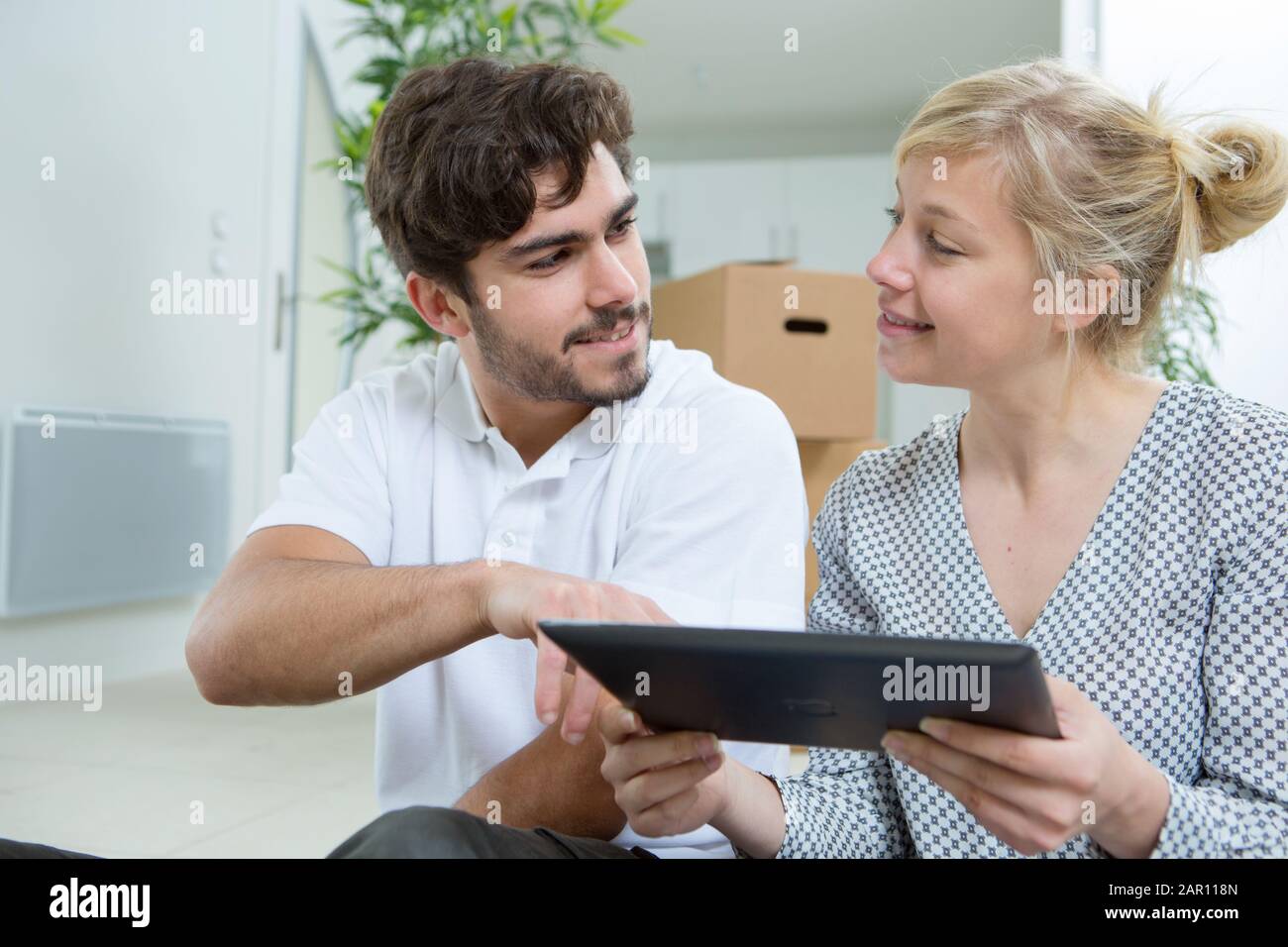 Removing tablet hi-res stock photography and images - Alamy