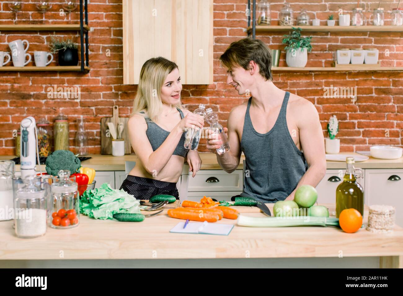 Couple Eating Food Feeding Sweet Concept. A happy couple is preparing ...