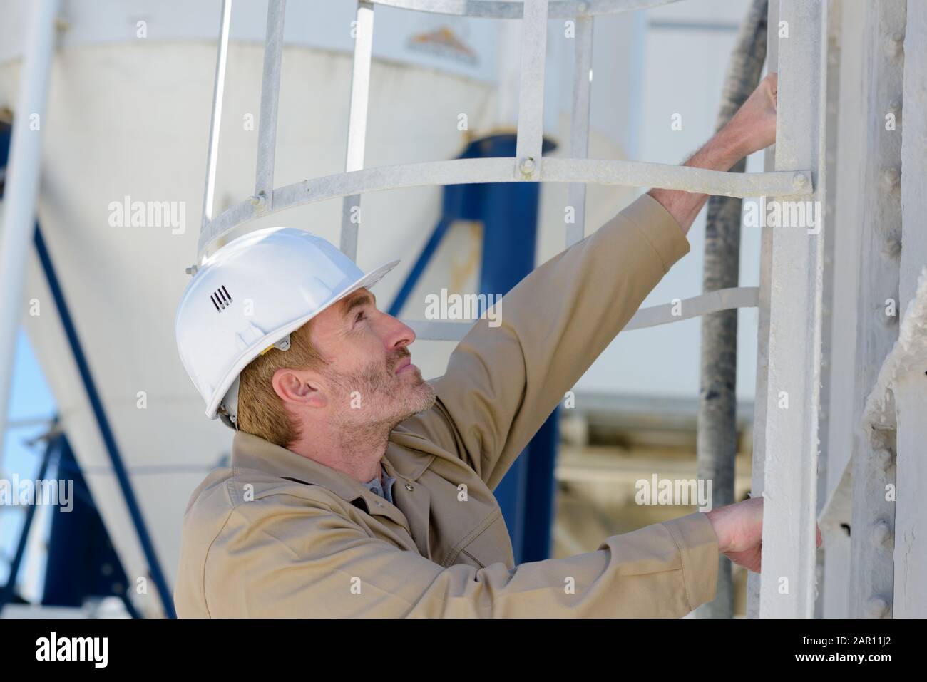 Climbing oil storage tank hi-res stock photography and images - Alamy