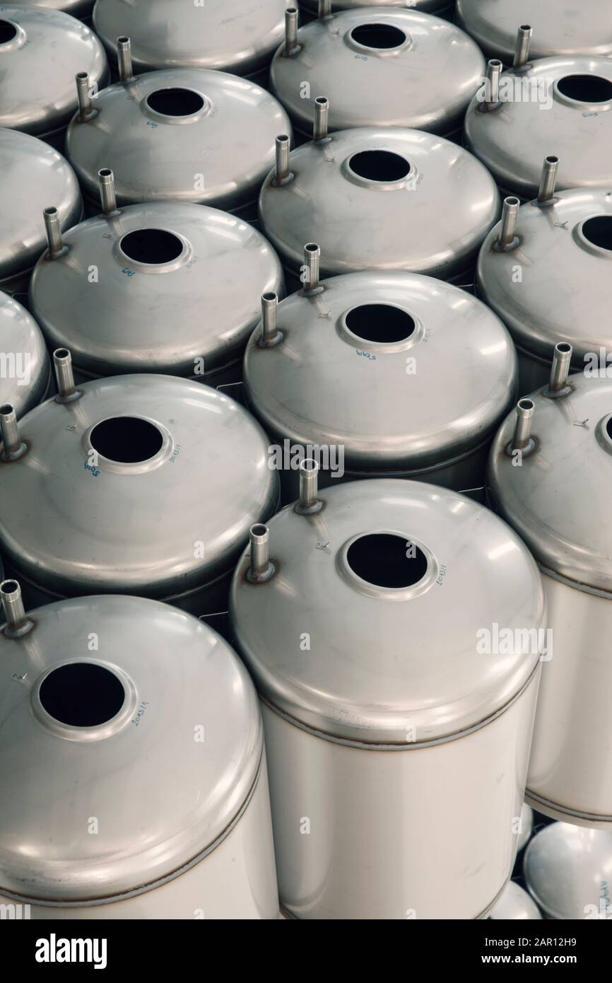 Stainless steel tanks on pile Stock Photo - Alamy