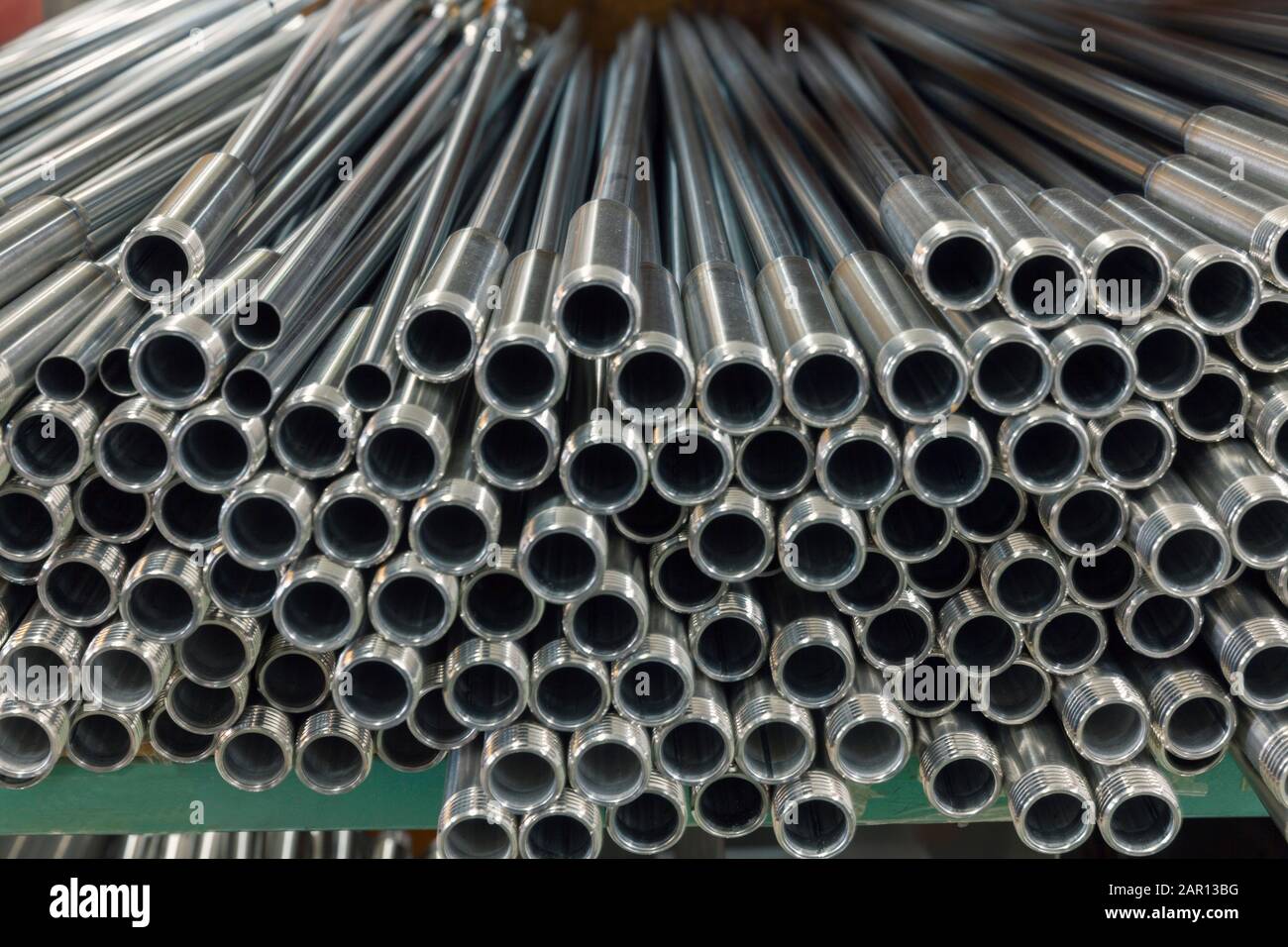 steel pipes on the pile, close up Stock Photo - Alamy