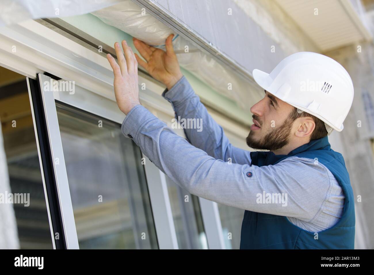 Person fitting window hi-res stock photography and images - Alamy