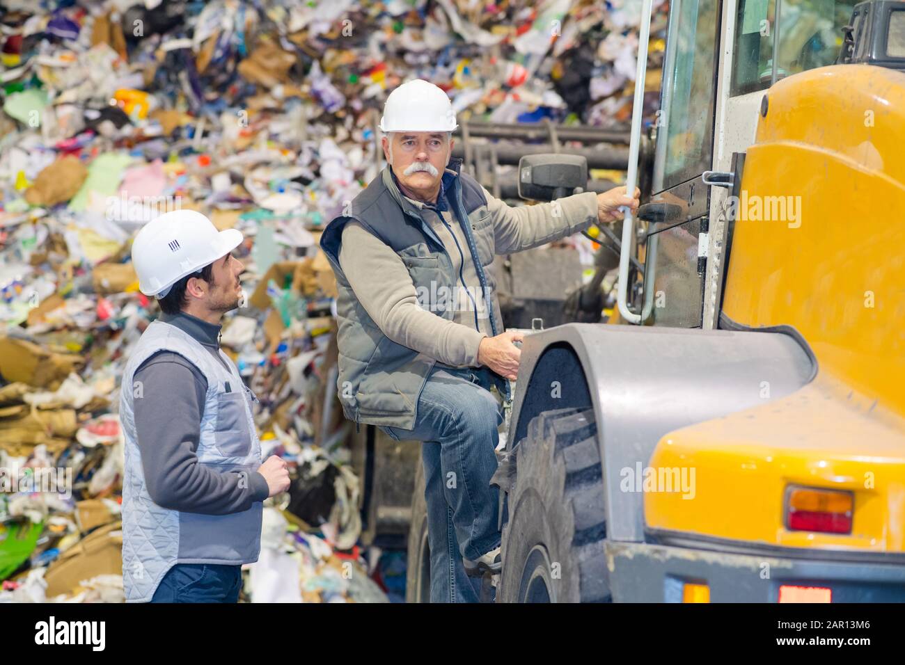 workers in a recycle center Stock Photo - Alamy