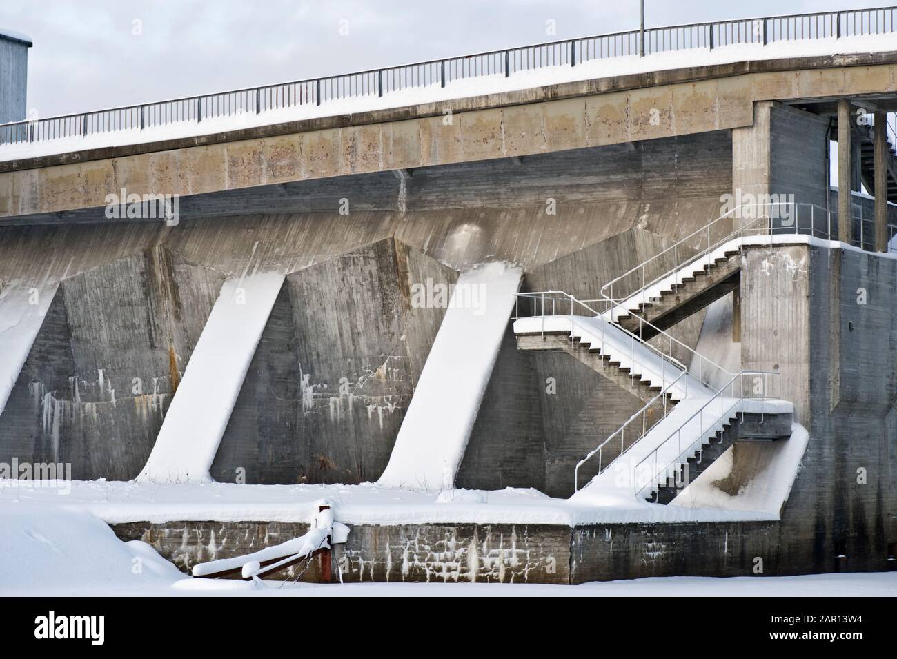 Concrete dam with staircase covered with snow Stock Photo - Alamy