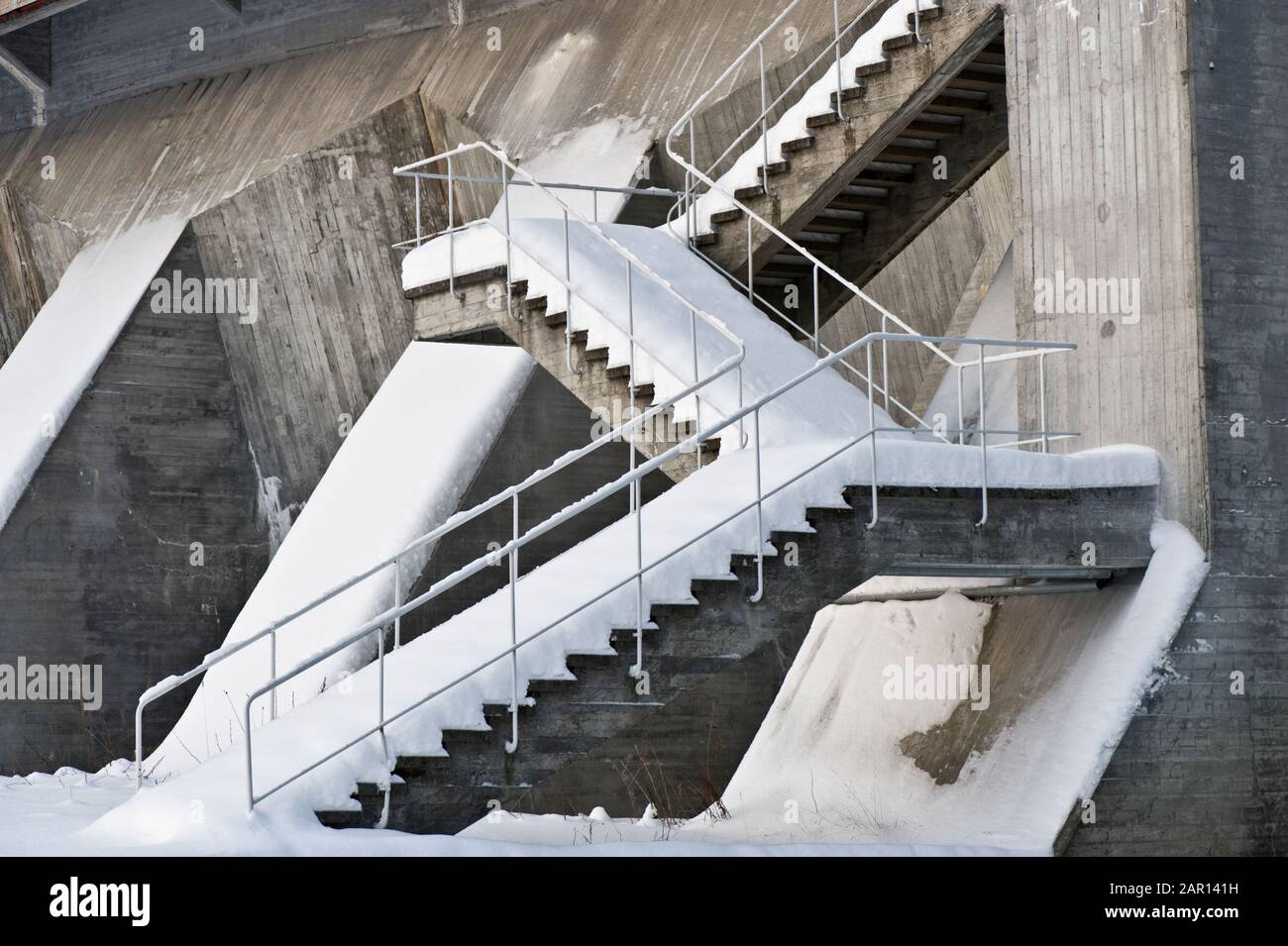 Concrete dam with staircase covered with snow Stock Photo - Alamy
