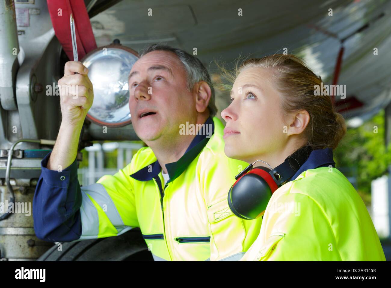 Plane preparation staff airport worker hi-res stock photography and ...