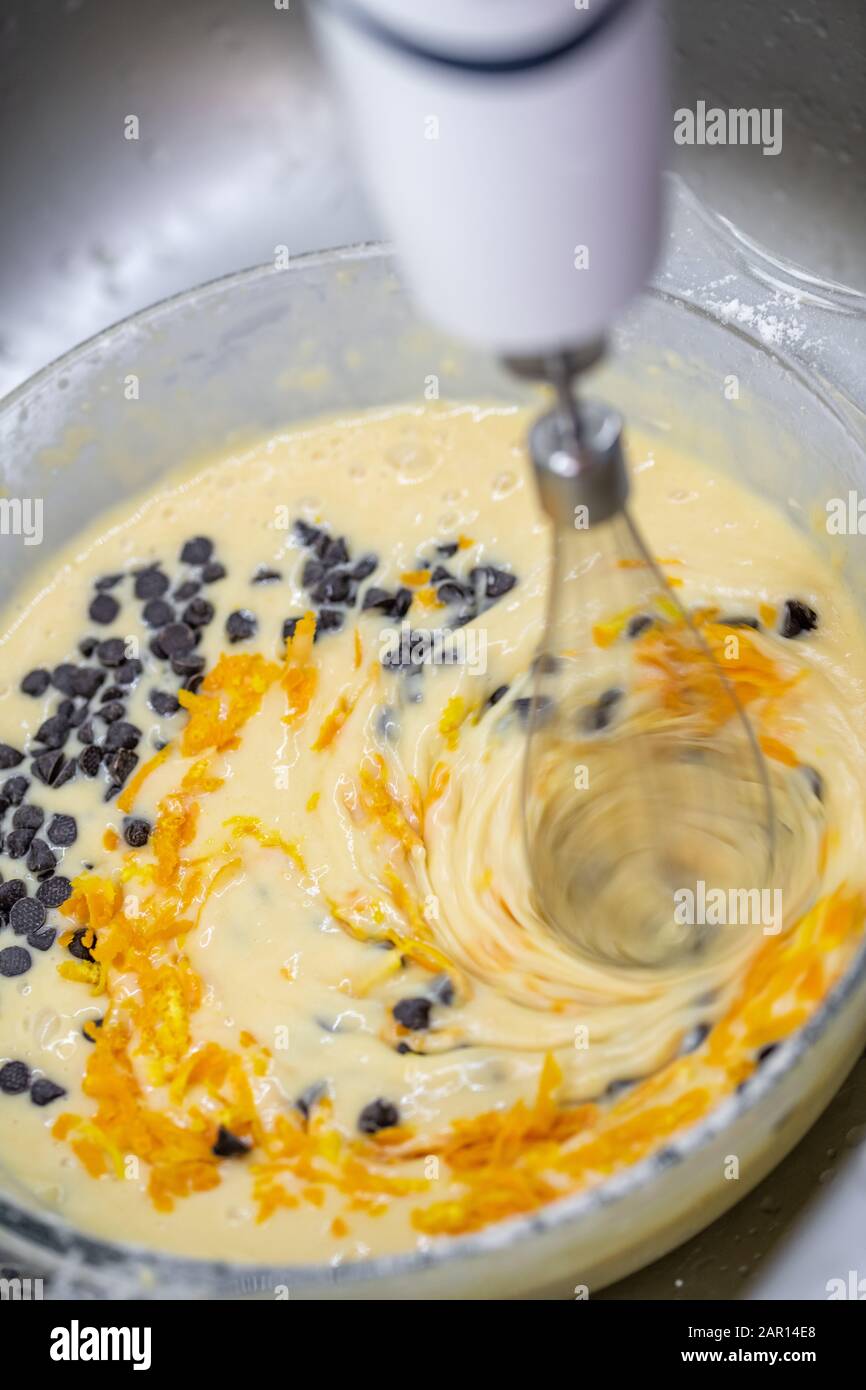 Motion blur photo of mixing homemade delicious cake Stock Photo - Alamy