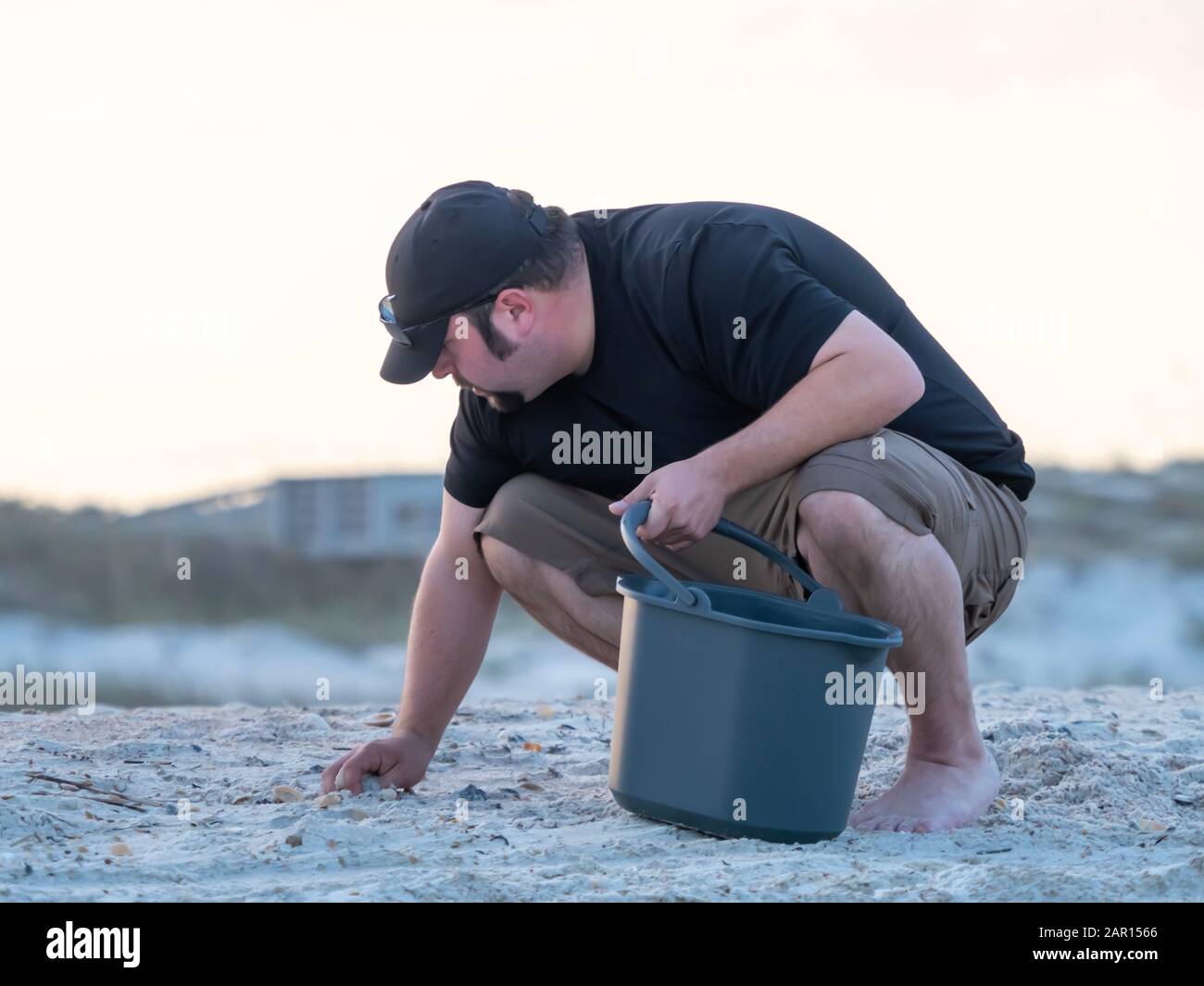 Man crouched down hi-res stock photography and images - Alamy