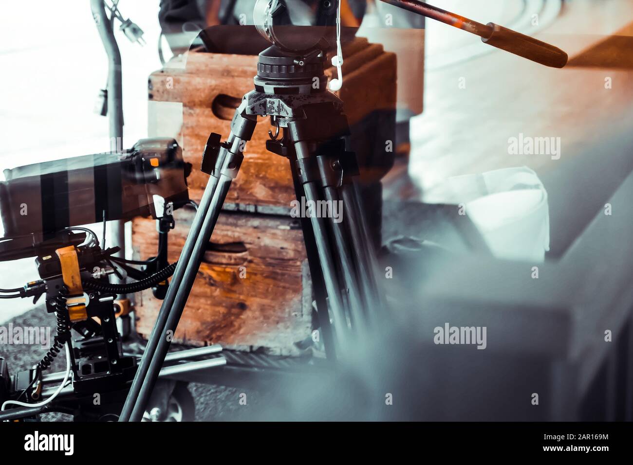 Film crew equipment, Detail image of Tripod background Stock Photo - Alamy
