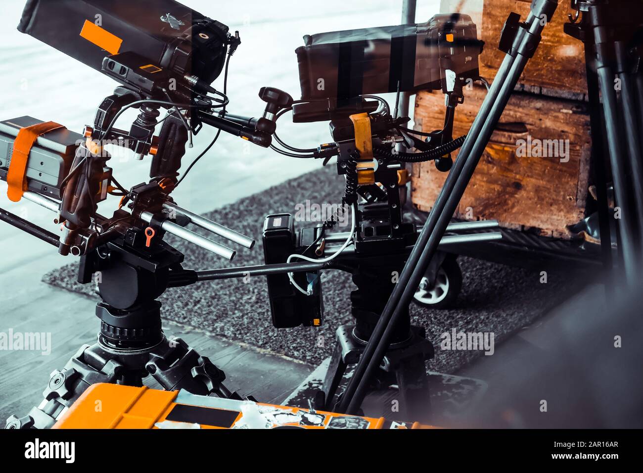 Film crew equipment, Detail image of Tripod background Stock Photo - Alamy