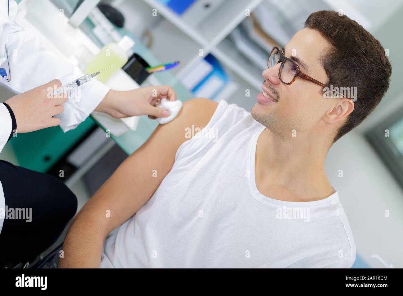 doctor and patient after blood test injection Stock Photo - Alamy