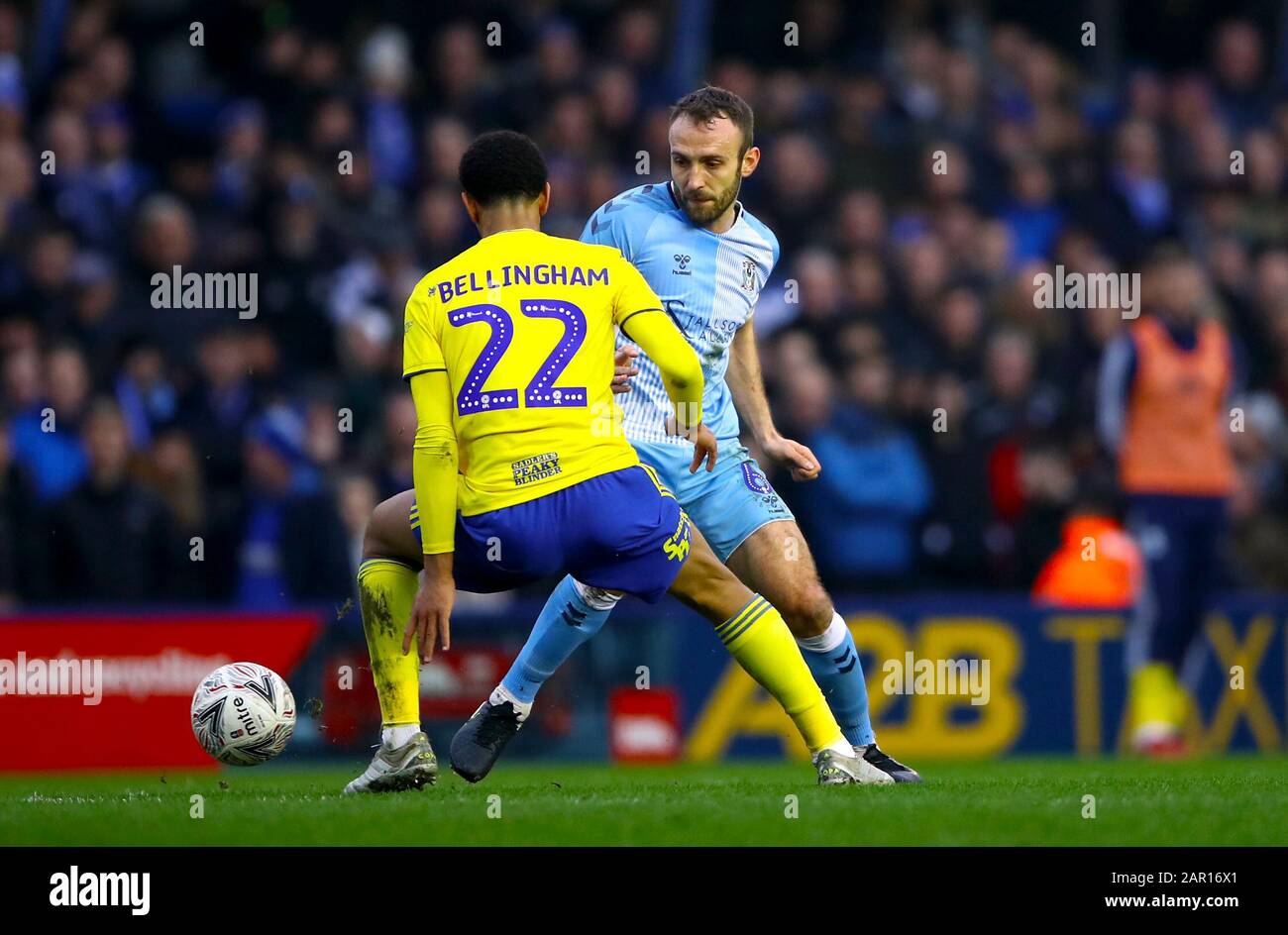 Birmingham City's Jude Bellingham (left) and Coventry City's Liam Kelly ...