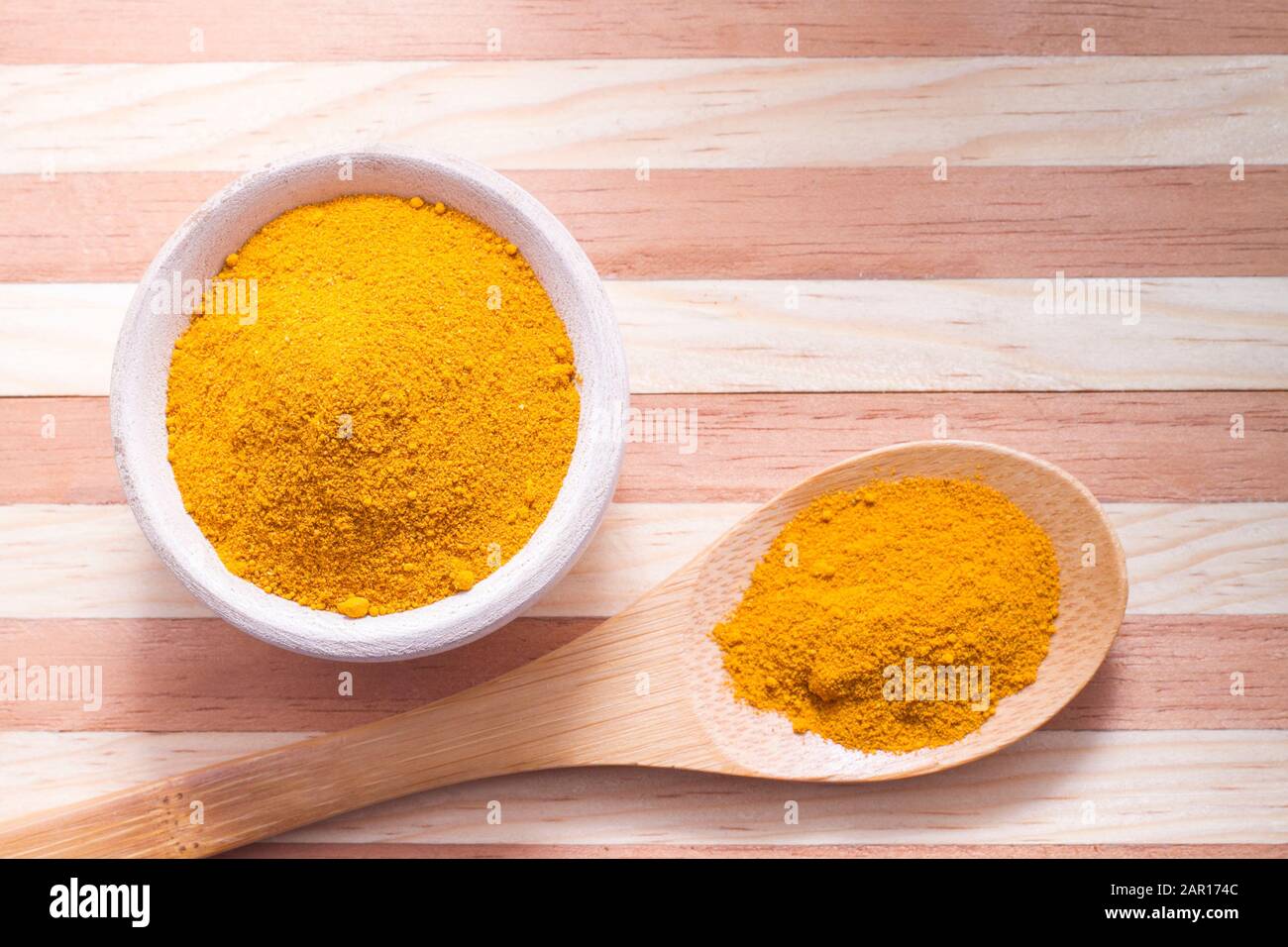 turmeric powder and roots, Asian origin plant containing curcumin has ...
