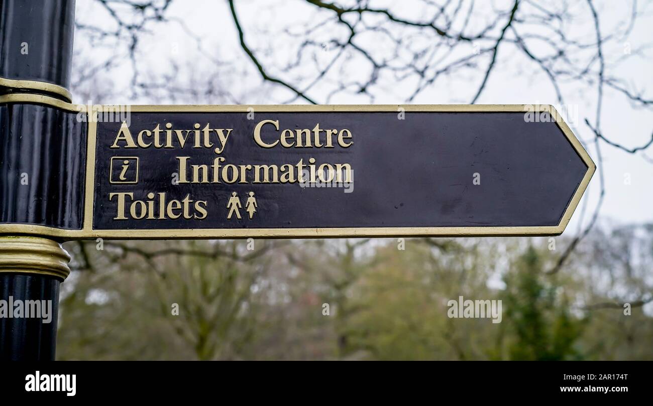 Public sign for Information, Activity Centre and toilets outdoors on ...