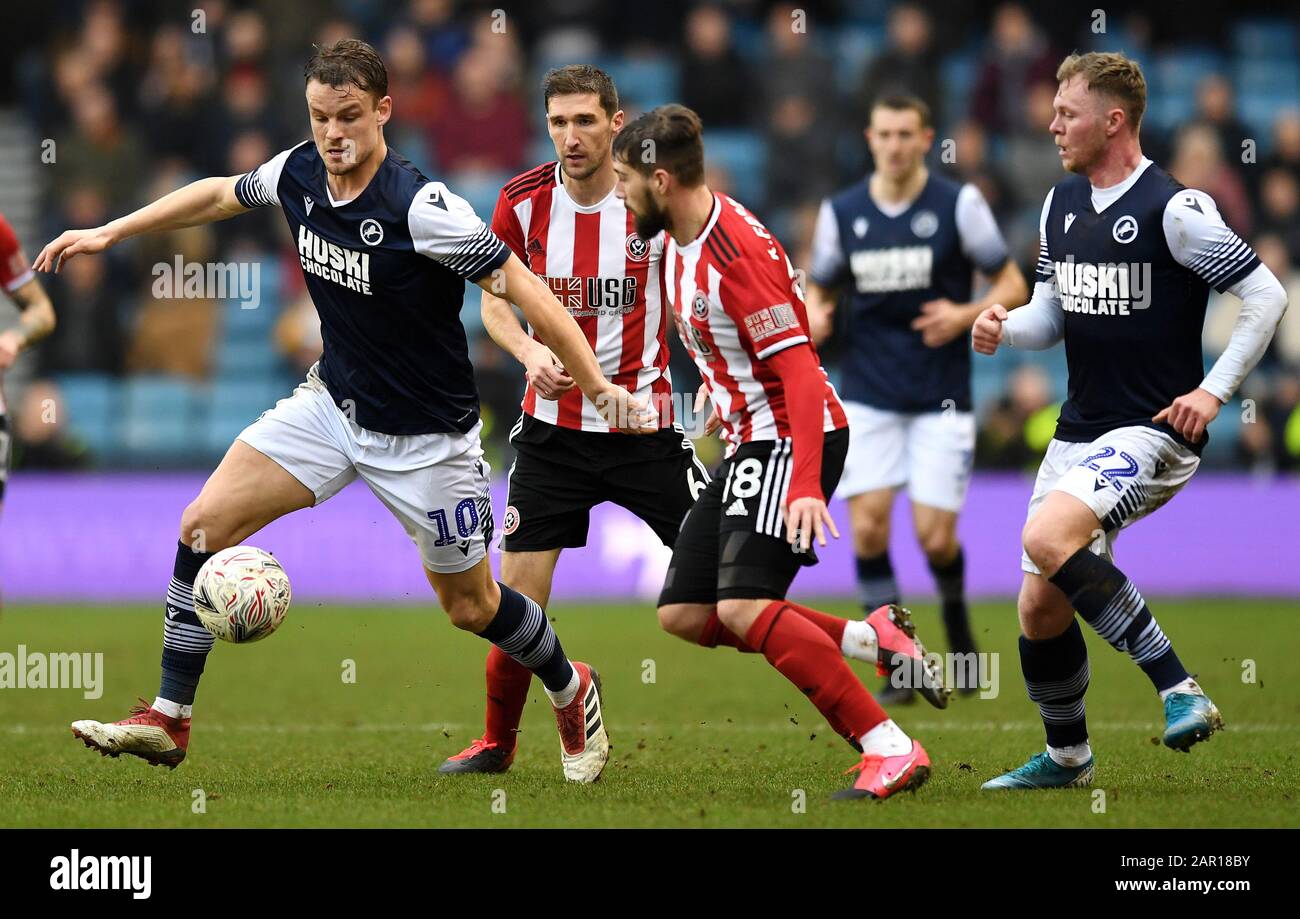 Millwall's (left-right) Matt Smith, Sheffield United's Chris Basham ...