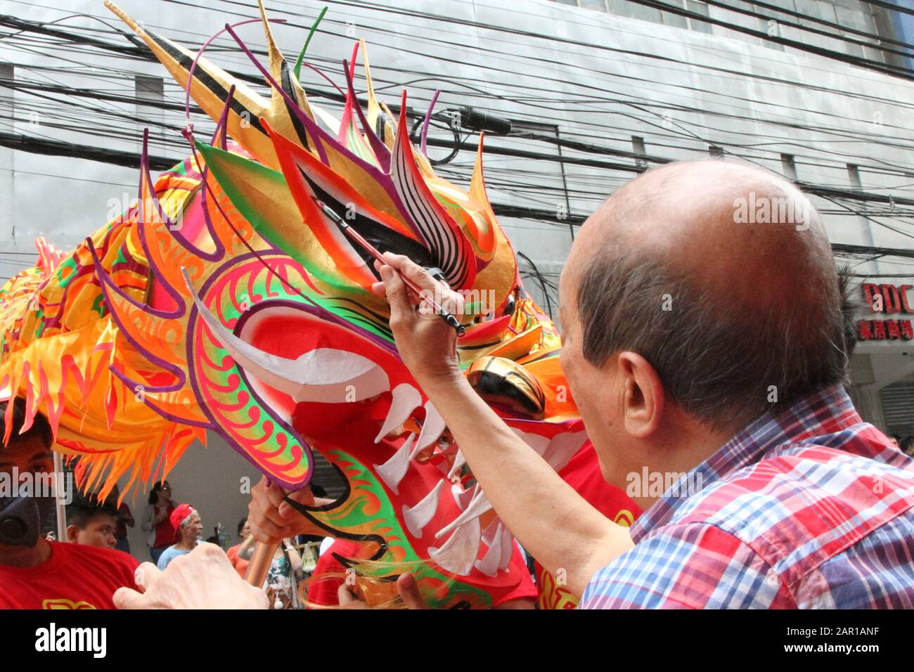 Manila, Philippines. 25th Jan, 2020. Lion and dragon dance were ...
