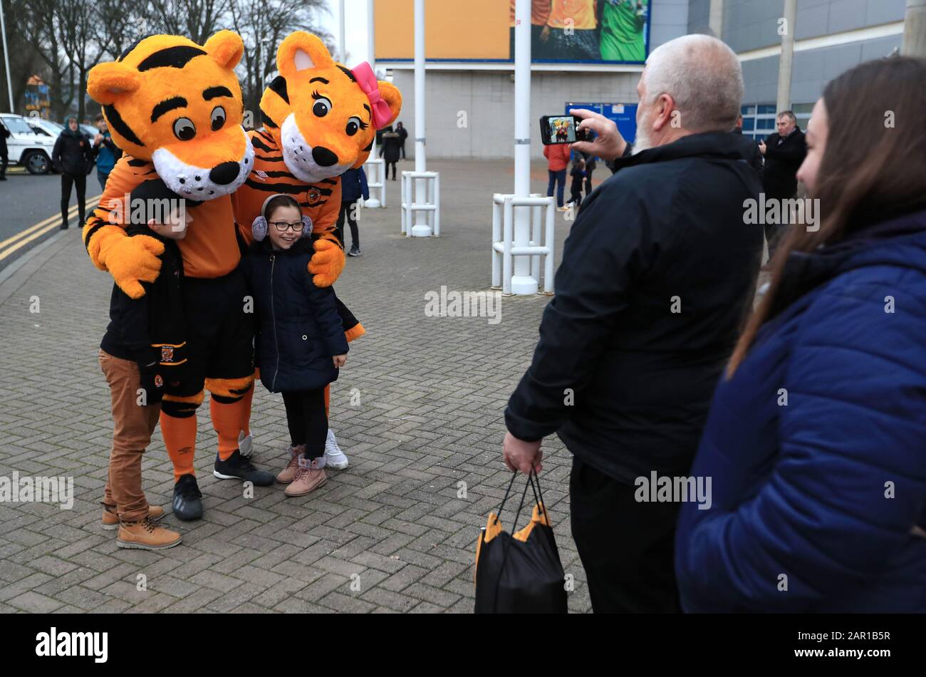Hull City mascots pose for a photograph with fans during the FA Cup ...