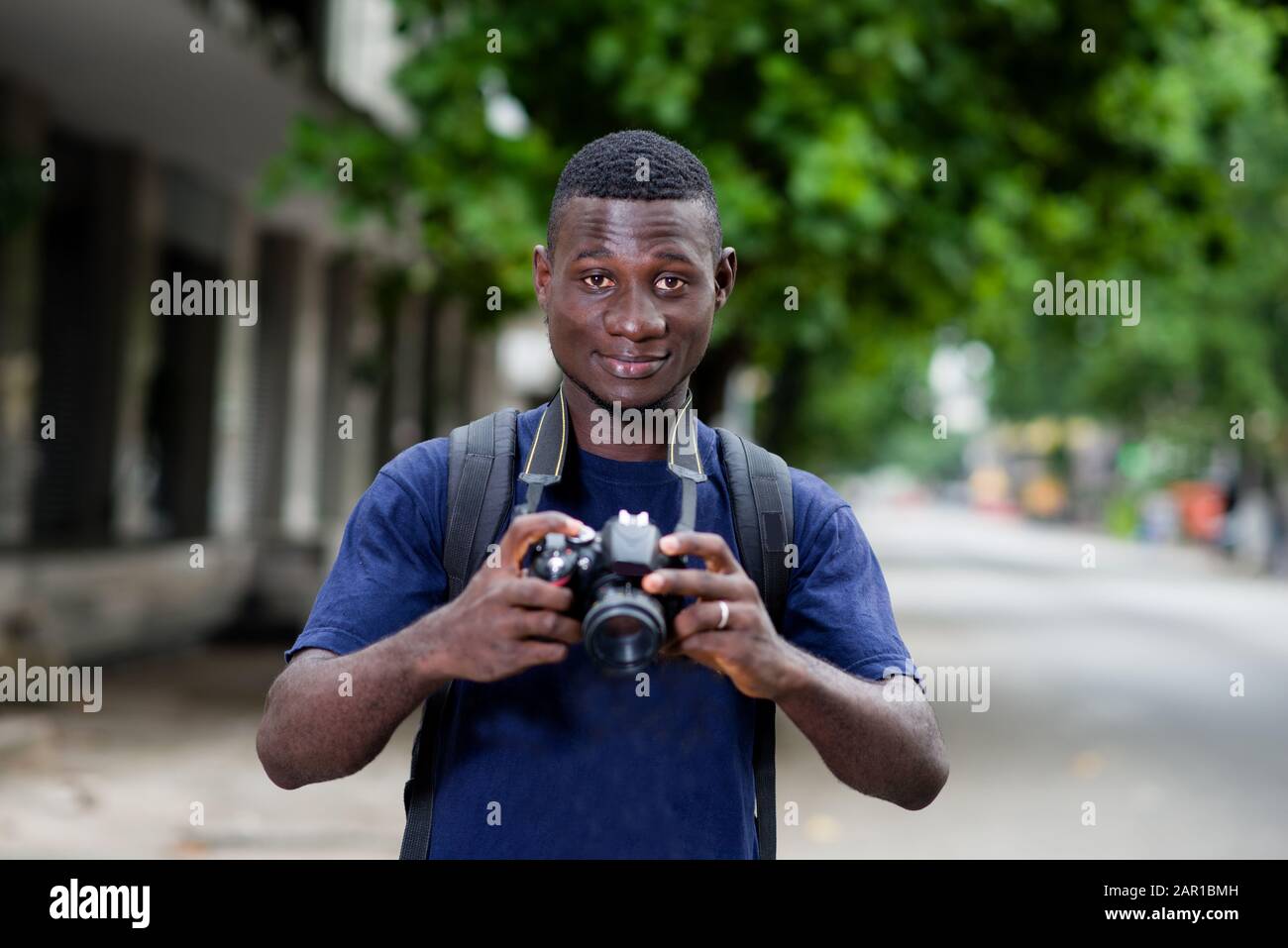 Young traveler or photographer doing tourism taking the picture of the ...
