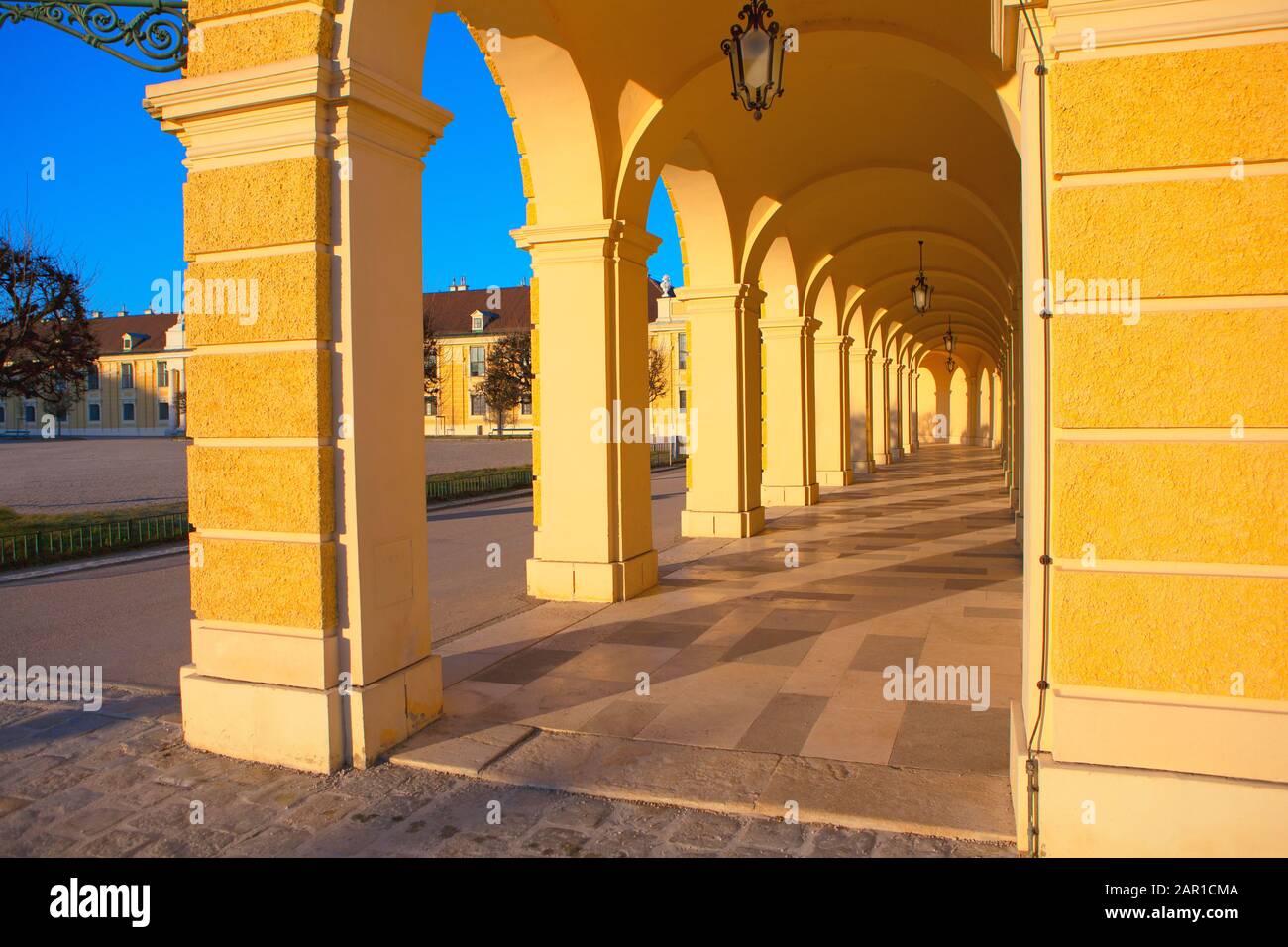 medieval exterior corridor with architectural arches Stock Photo - Alamy