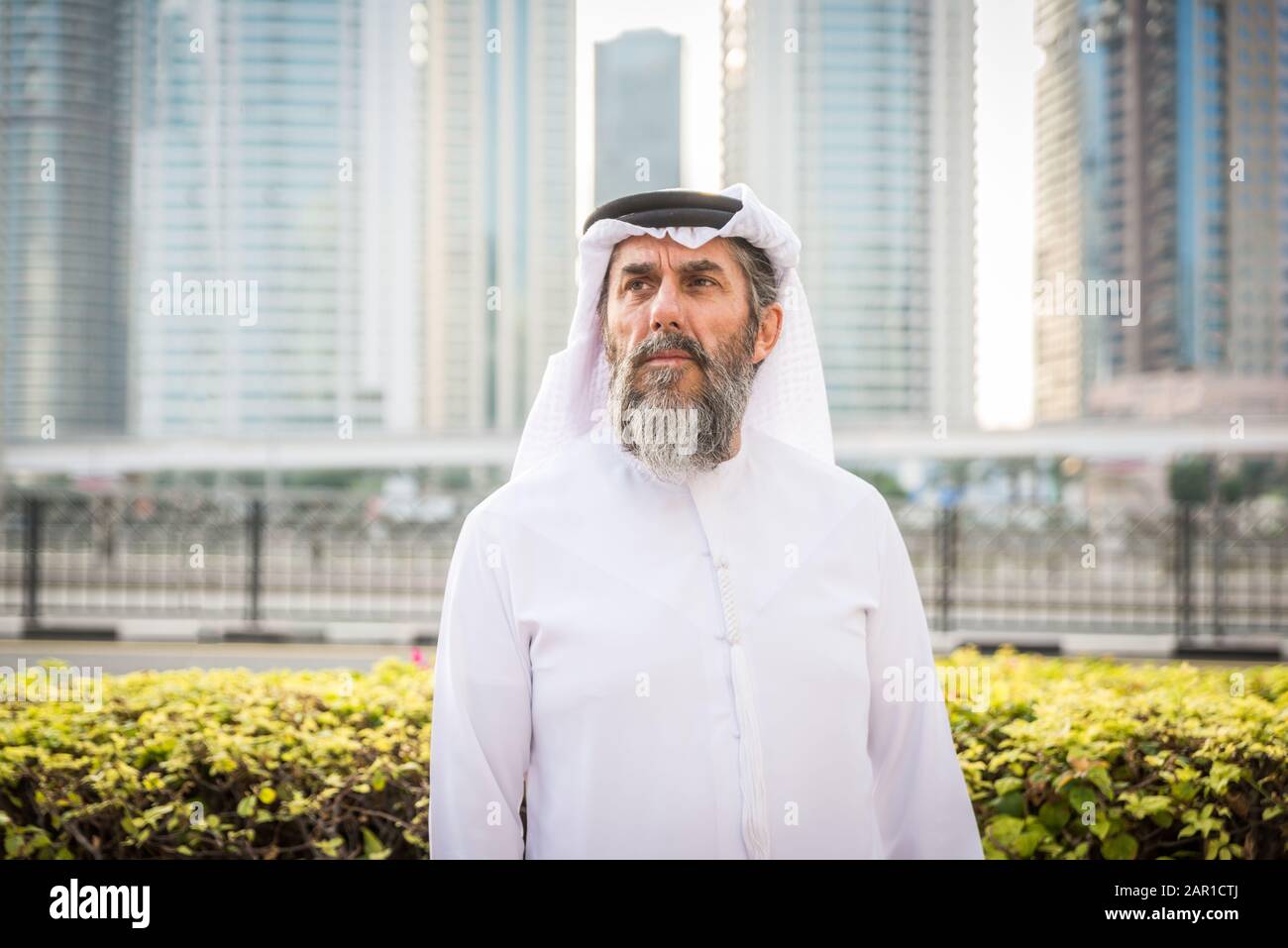 Middle-eastern senior man with traditional kandora in Dubai Stock Photo ...