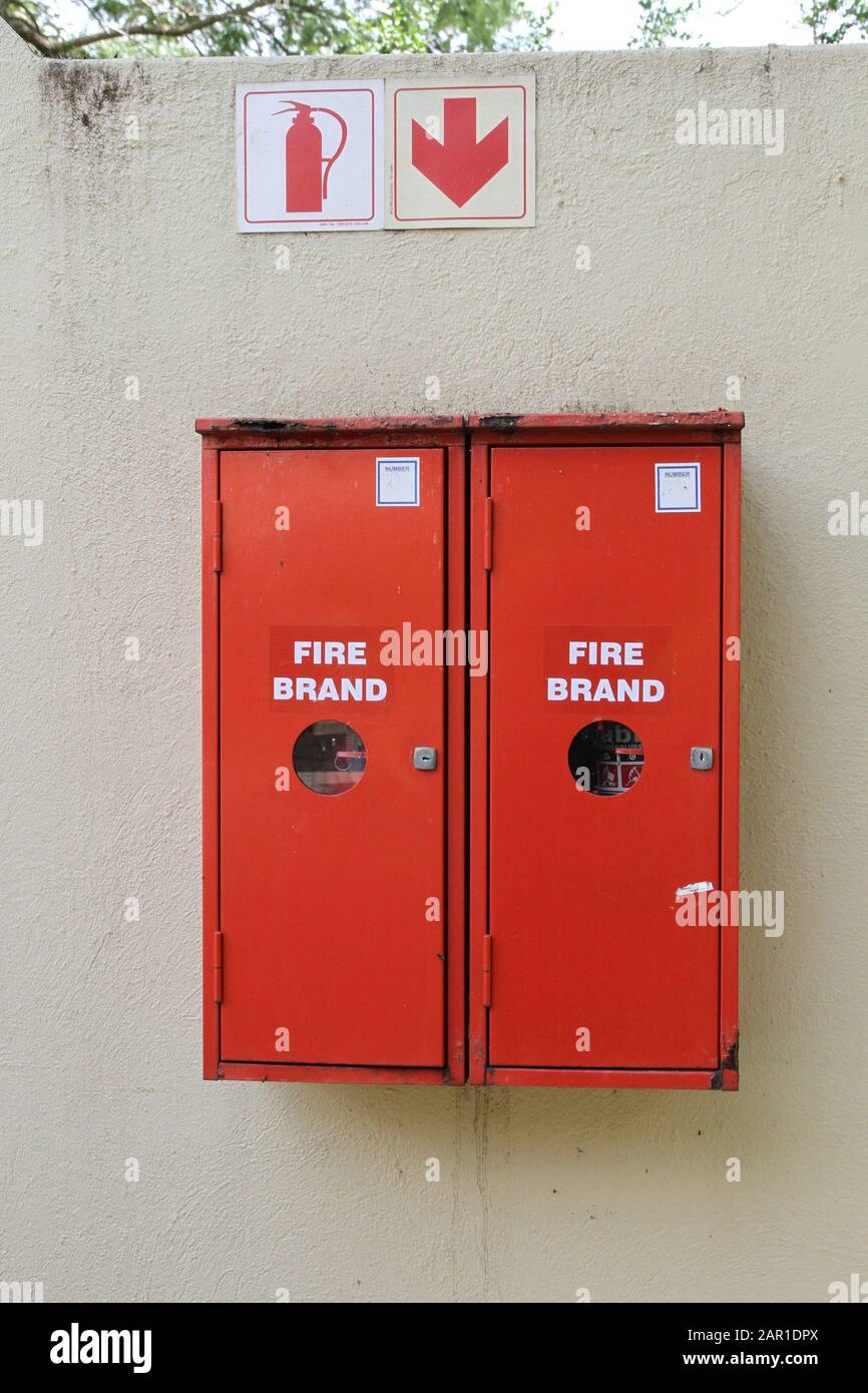 Fire emergency signs with locked fire extinguishers, Sanbonani Resort ...