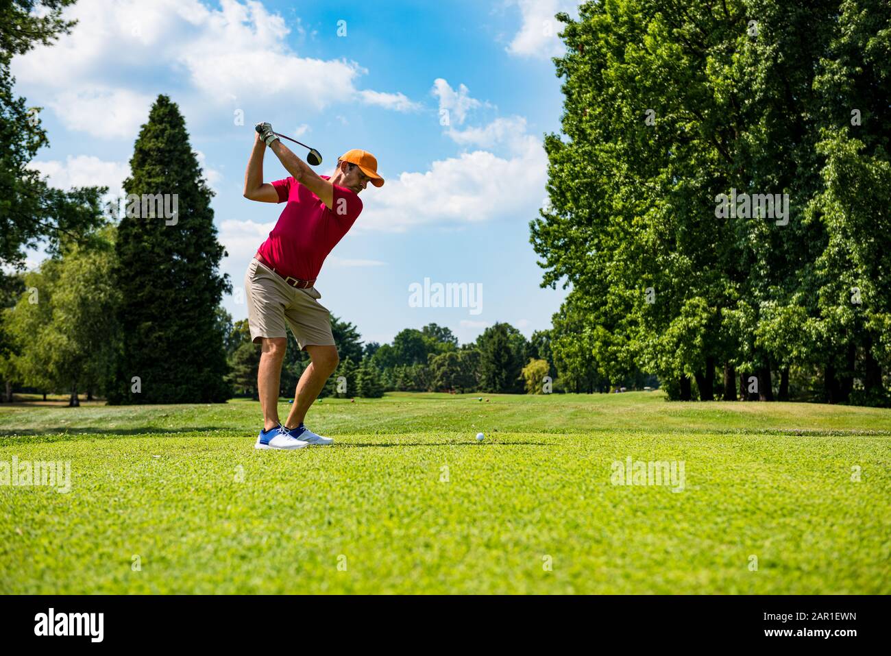 Hitting the perfect golf shot Stock Photo - Alamy