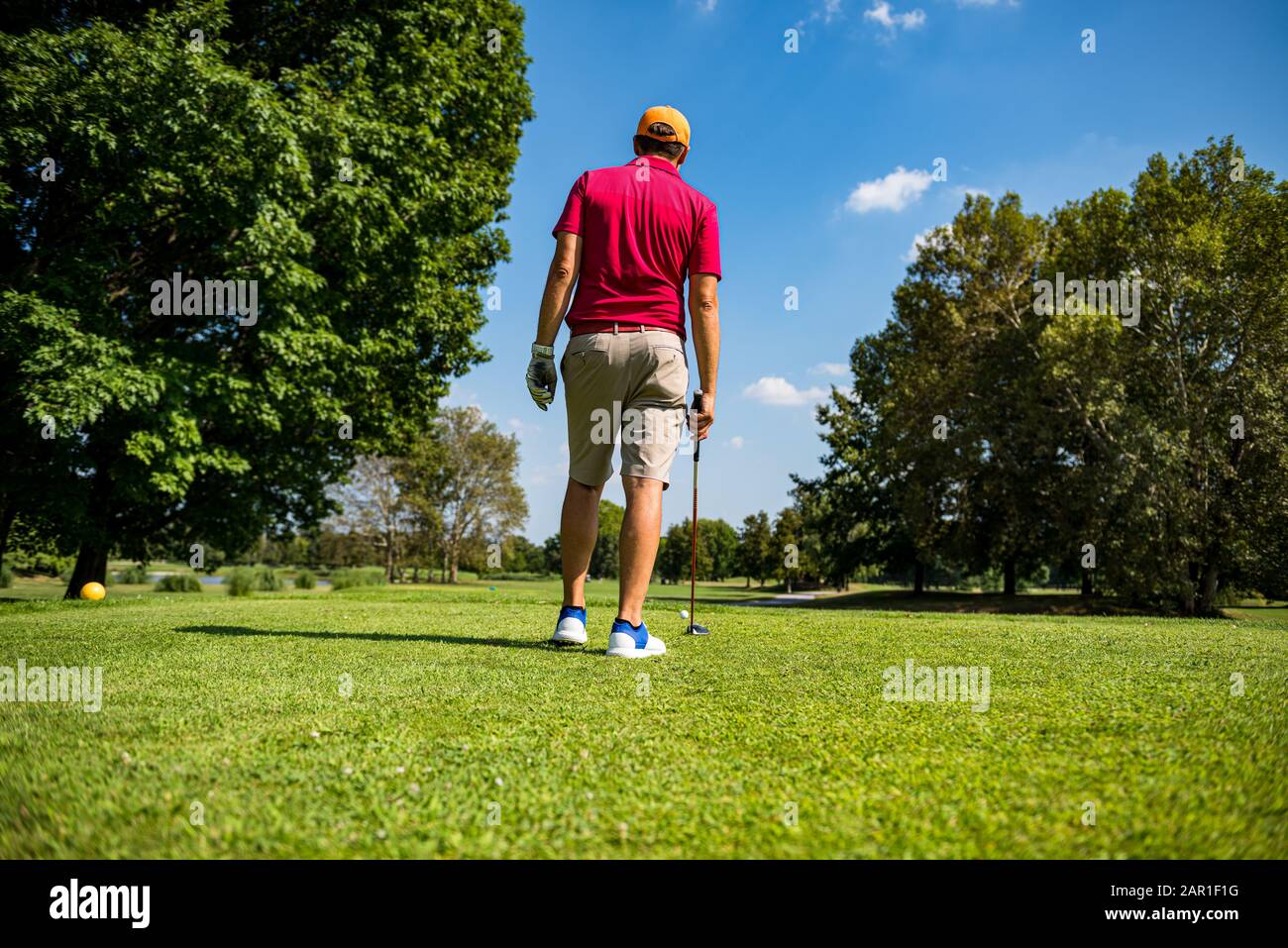 Hitting the perfect golf shot Stock Photo - Alamy