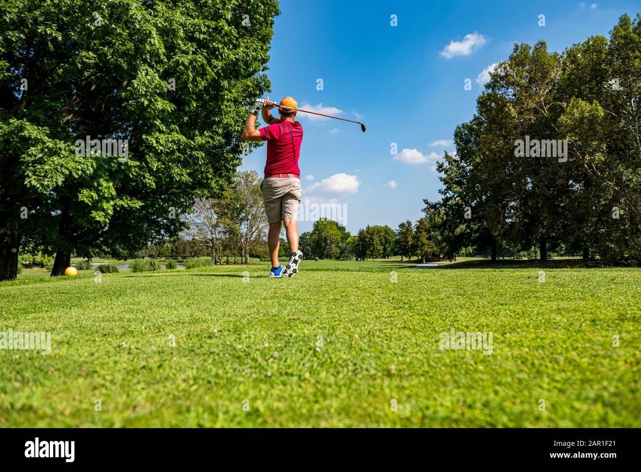 Hitting the perfect golf shot Stock Photo - Alamy