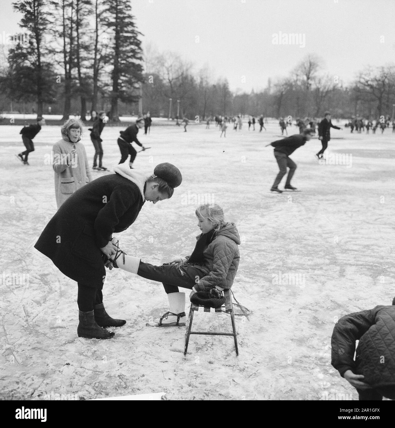 Child sitting on a sleigh Black and White Stock Photos & Images - Alamy