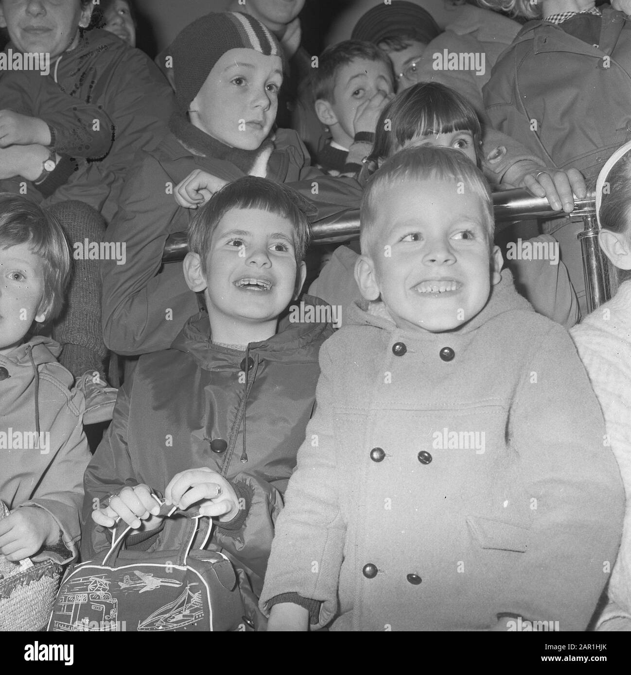 Laughing youthful spectators hi-res stock photography and images - Alamy