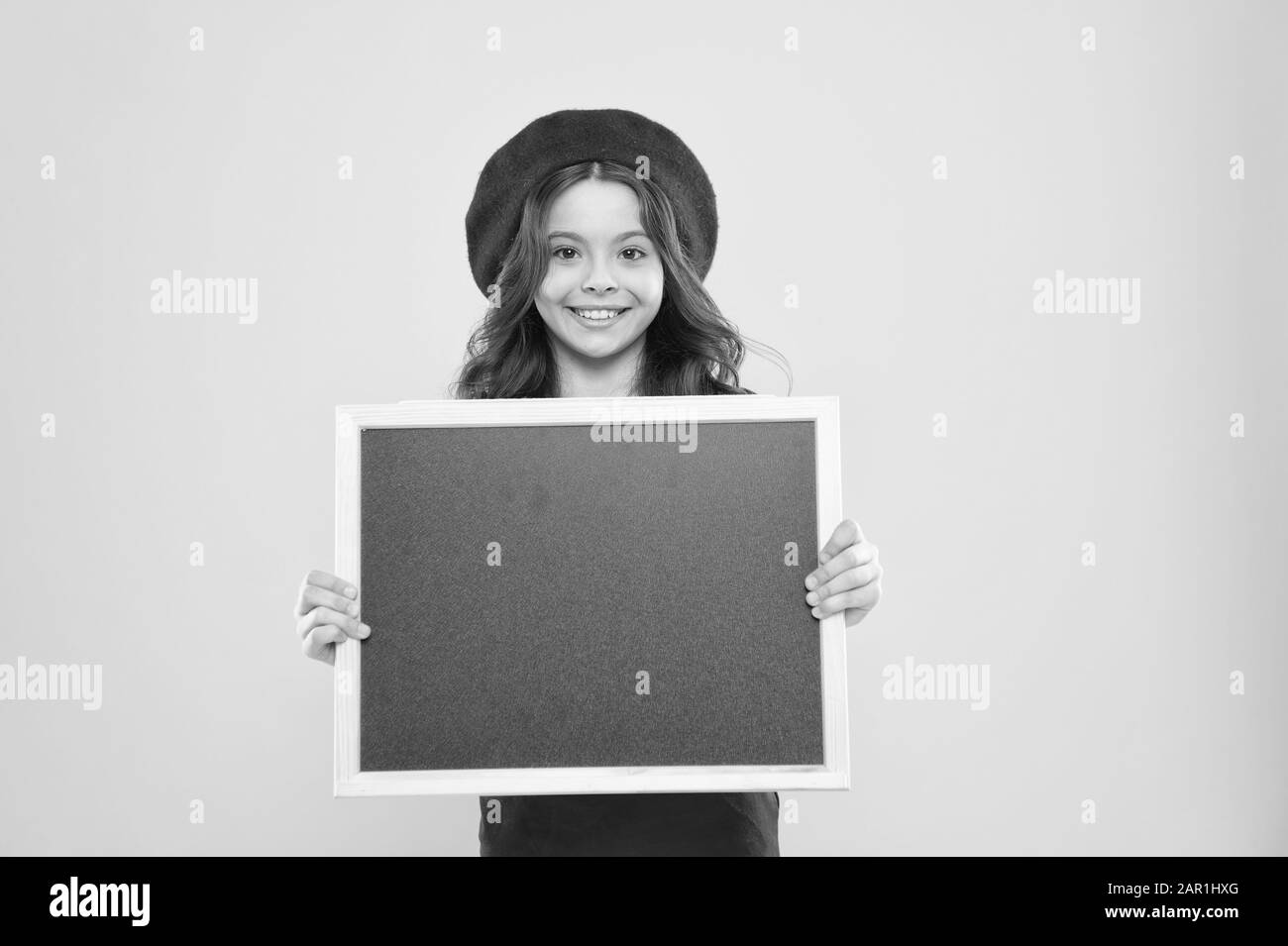 little girl kid with backboard, copy space. board for announcement ...