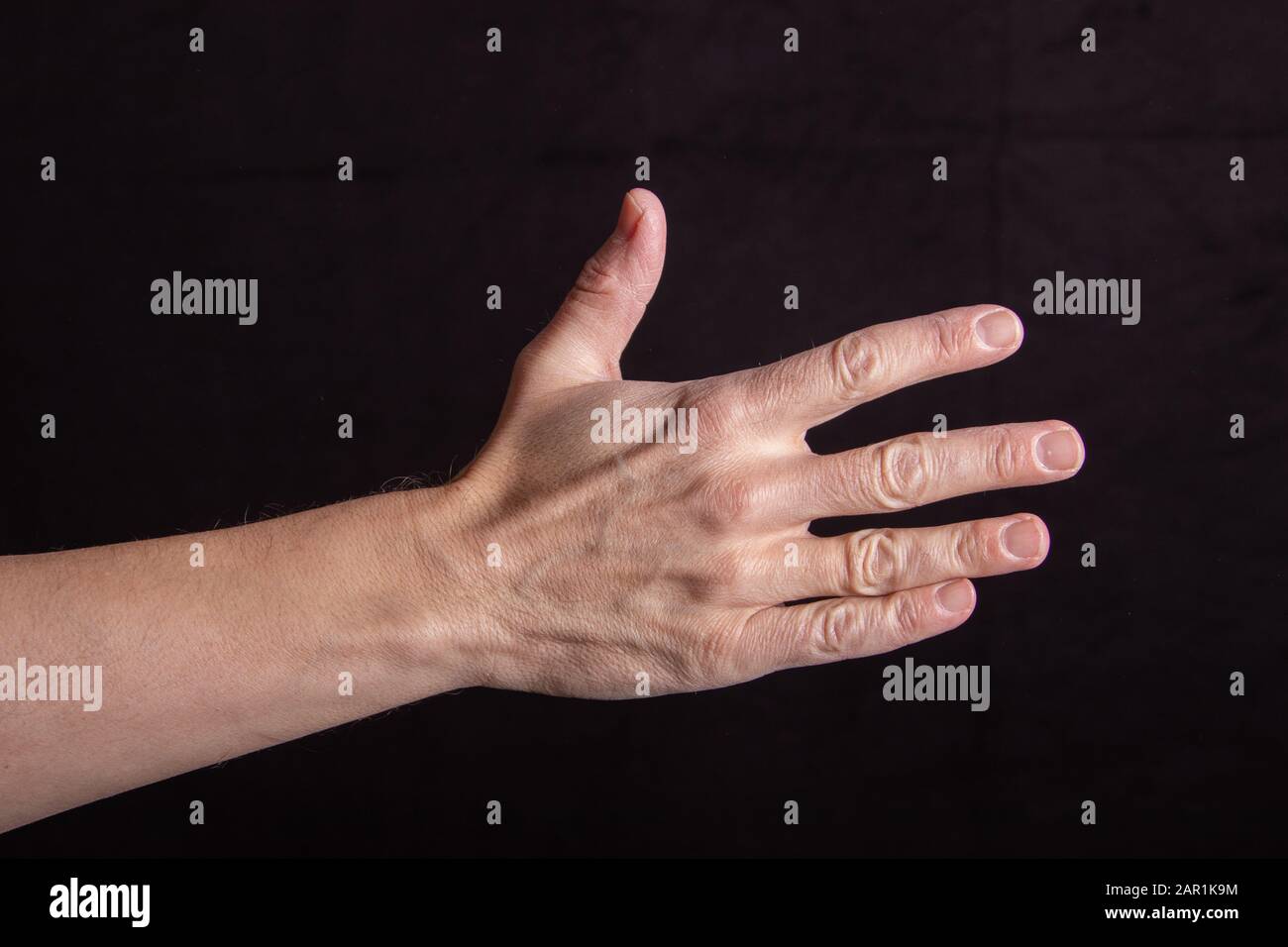 Hand gesture point five hi-res stock photography and images - Alamy