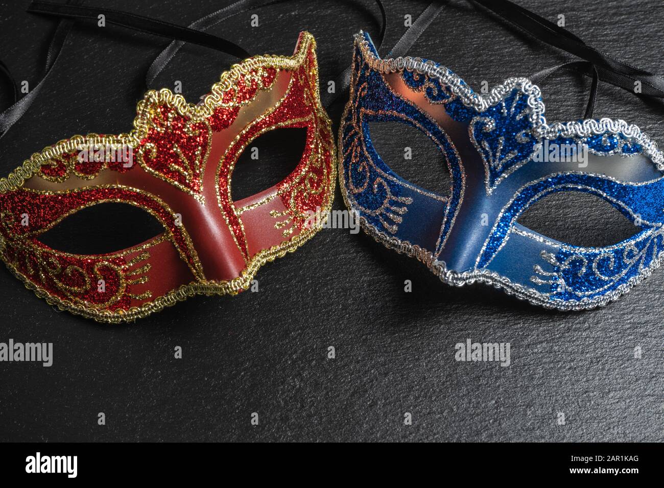 The Colombina, red, blue carnival or masquerade mask Stock Photo - Alamy