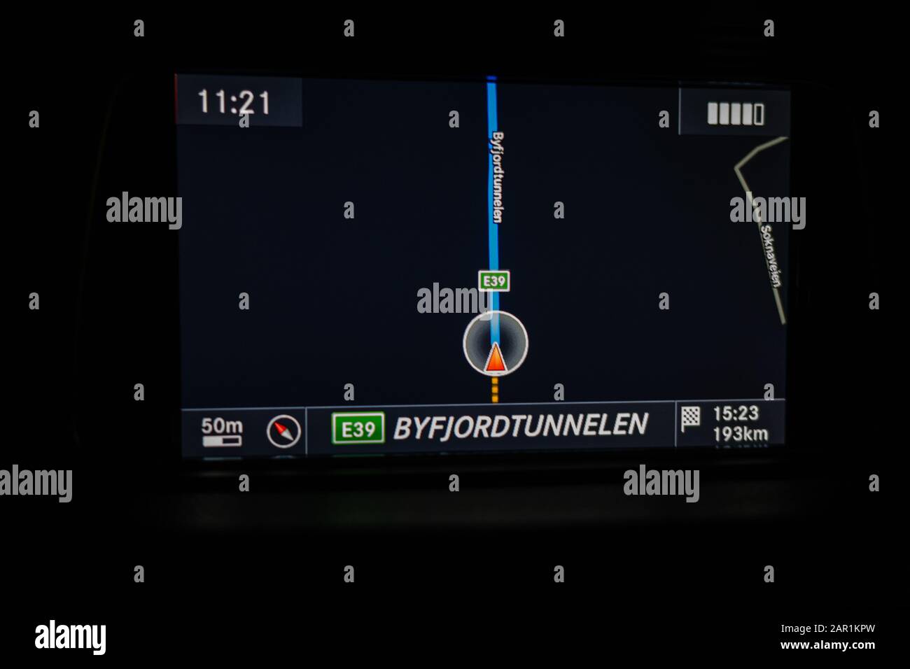Car navigator screen showing that the car is driving on the E39 road ...