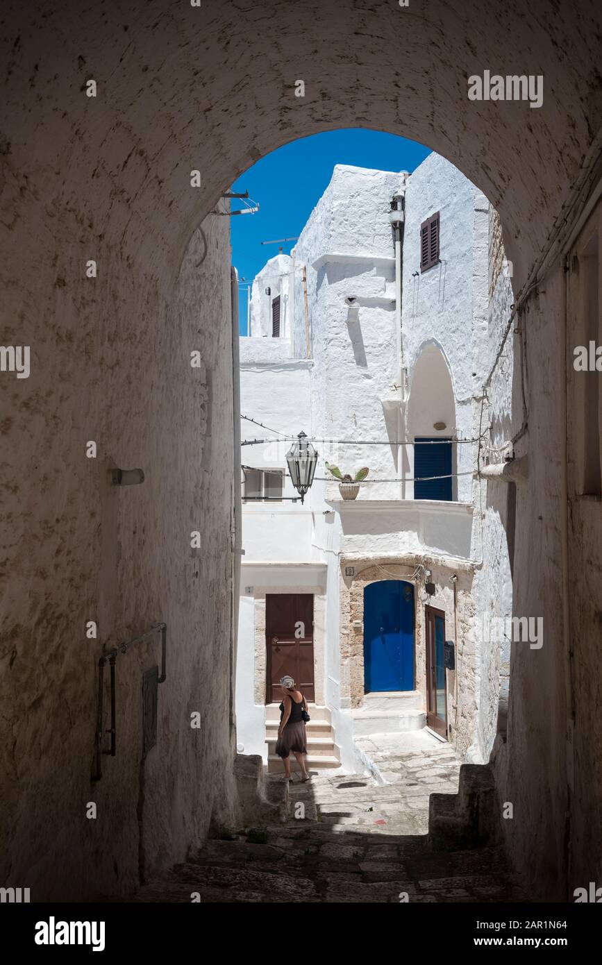 Medieval whitewashed street of Ostuni, Puglia, Italy Stock Photo - Alamy