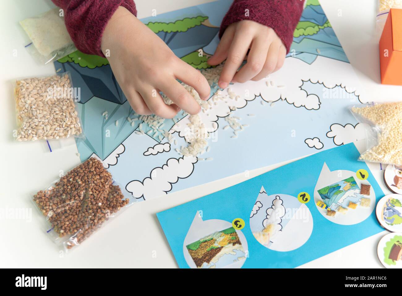 development of fine motor skills. child makes picture of different ...