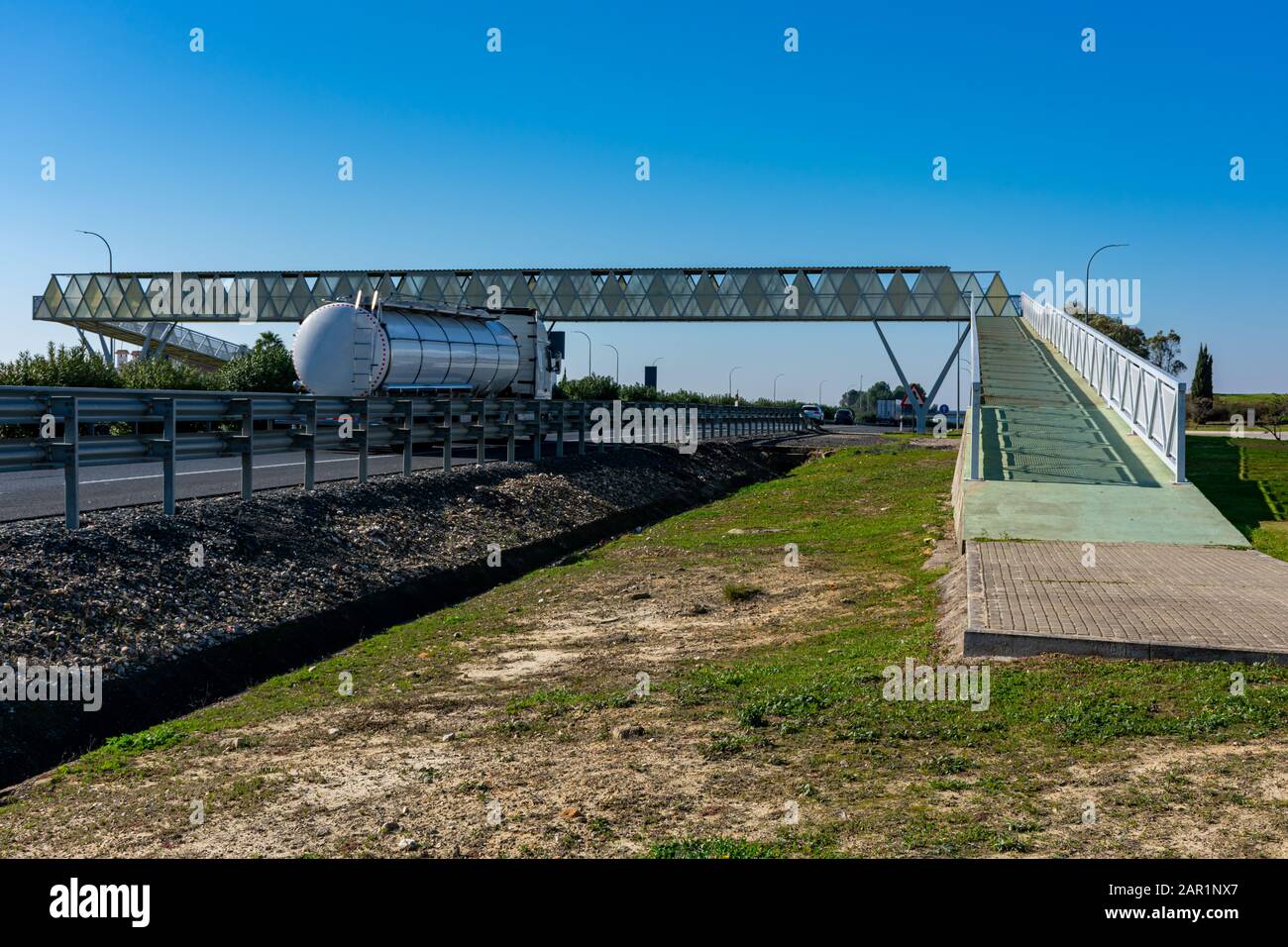 Tank truck driving on the highway Stock Photo - Alamy