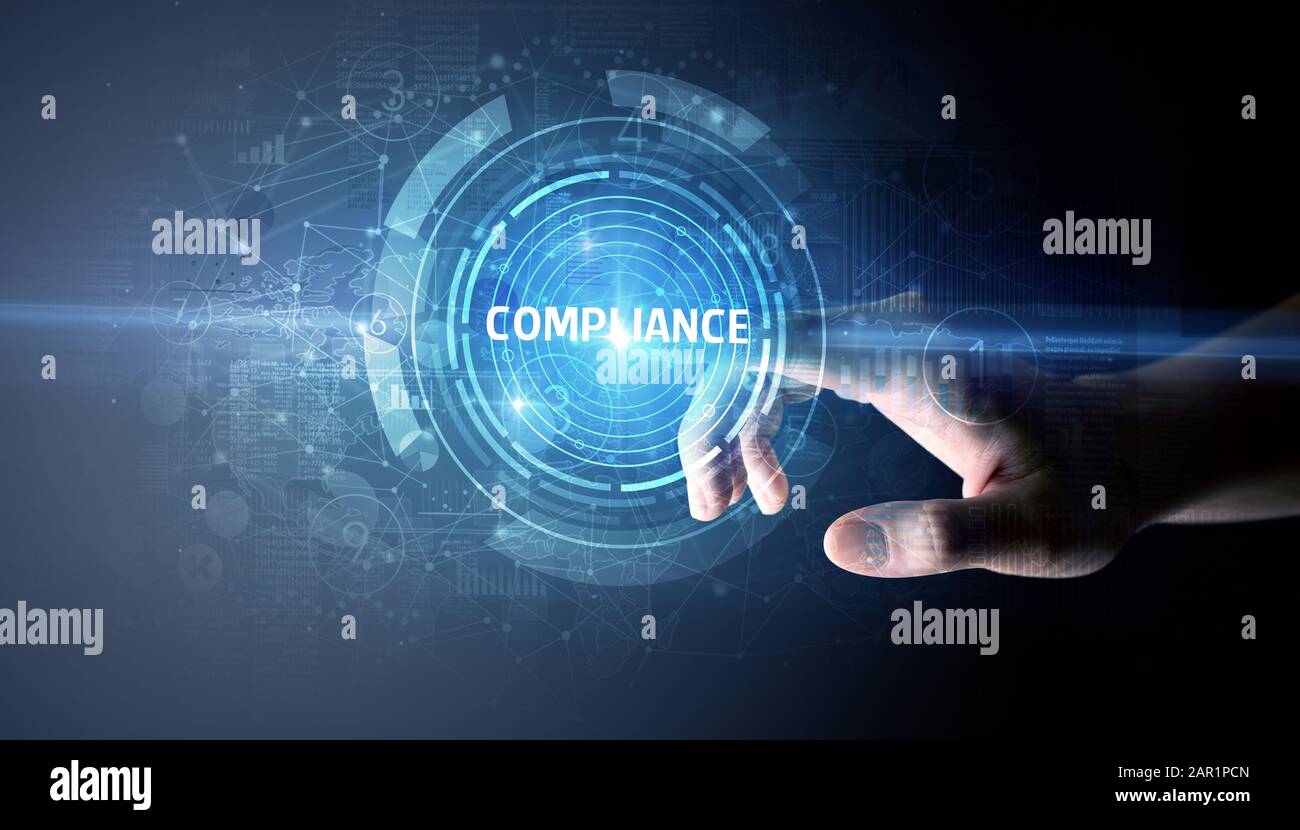 Hand touching COMPLIANCE button, modern business technology concept ...